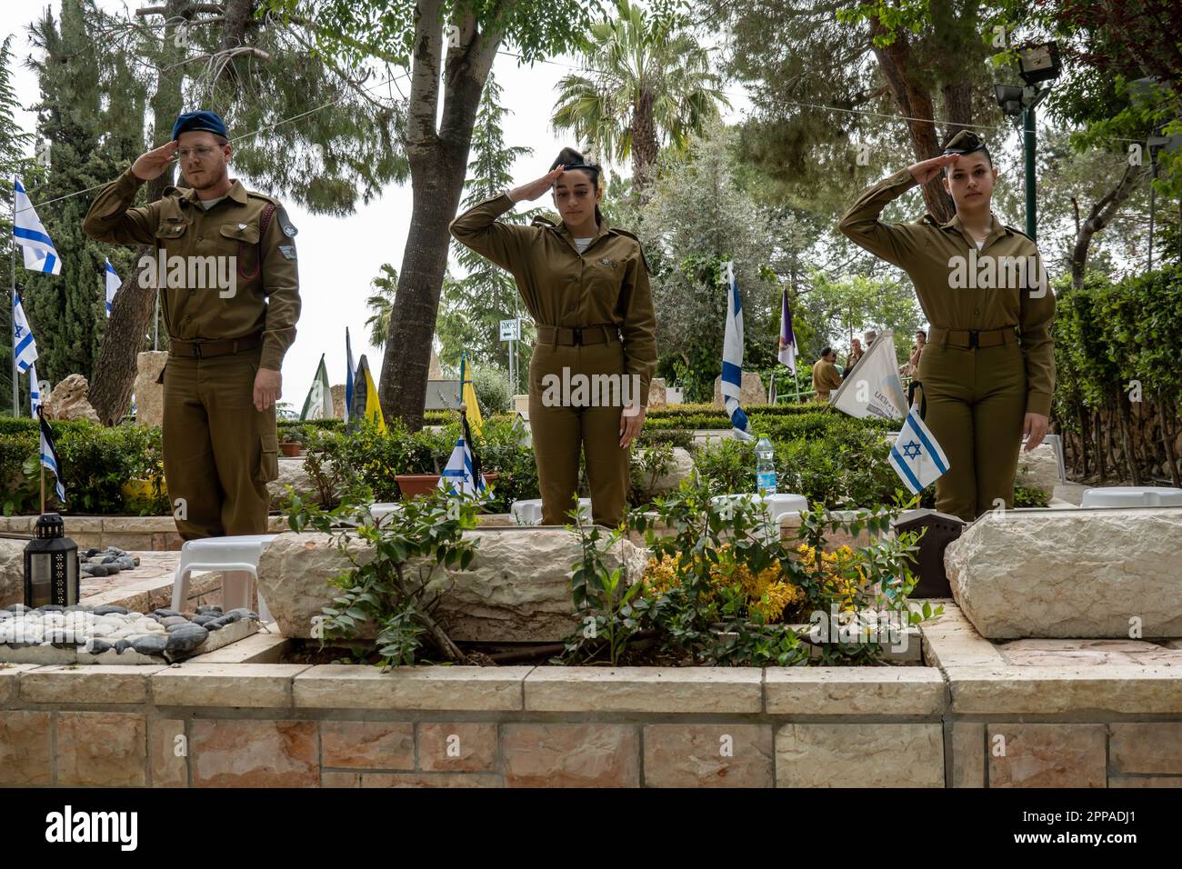 Jerusalem, Israel. 23rd Apr, 2023. IDF soldiers place small Israeli ...