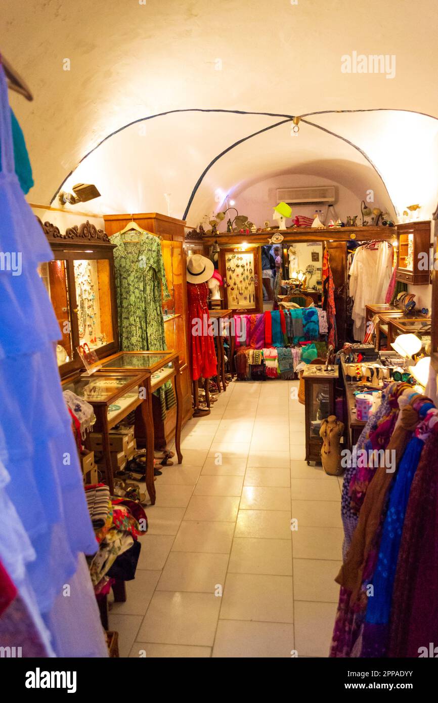 Picturesque souvenir shop in Oia .Oia is a coastal town on the ...