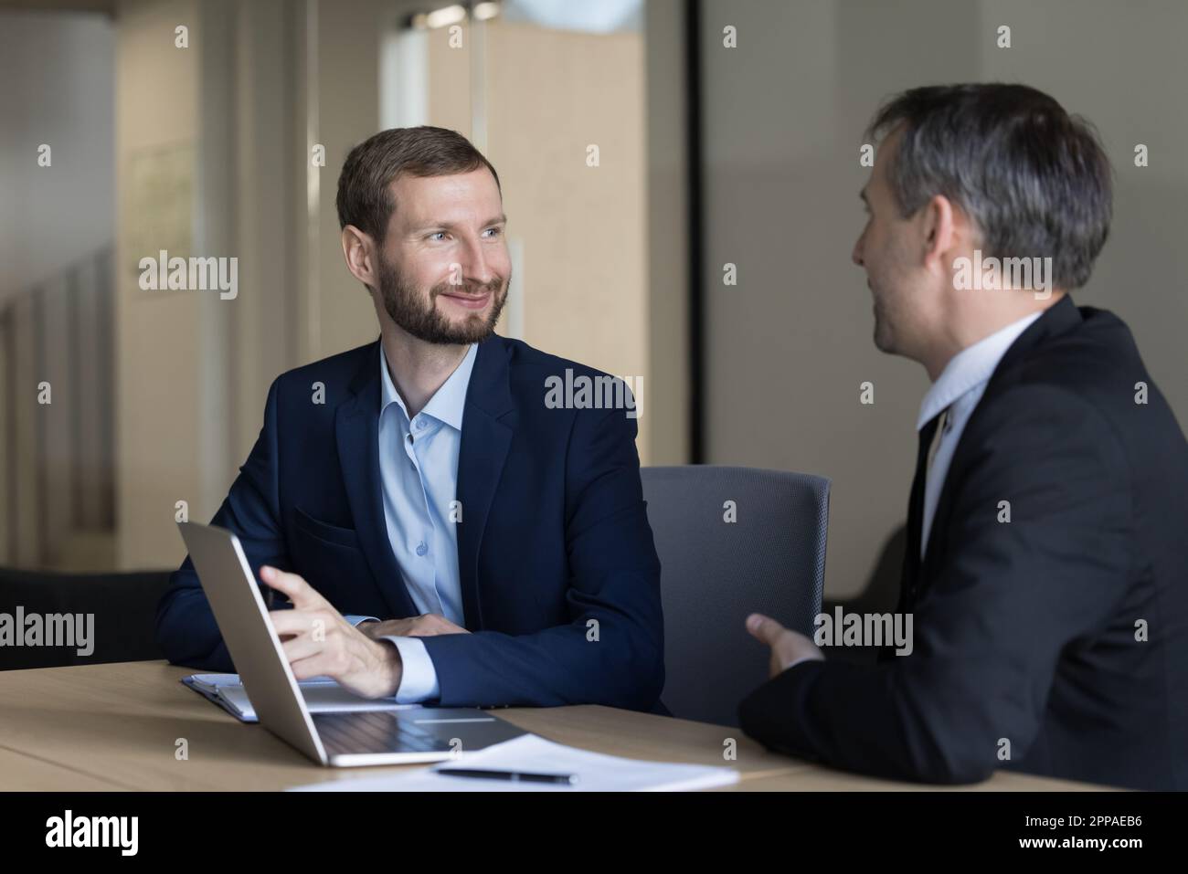 Two men talking older young hi-res stock photography and images - Alamy