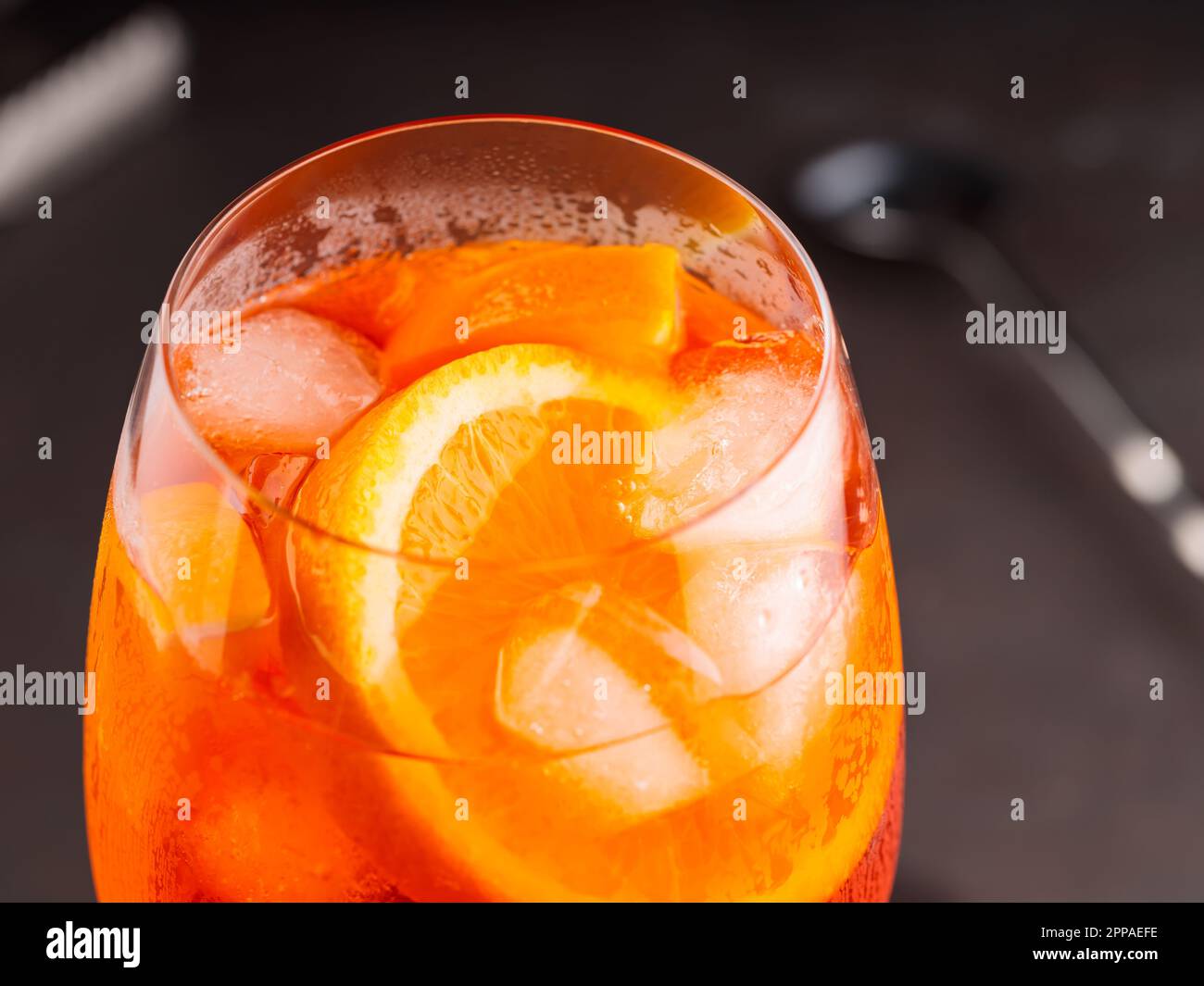 Aperol Spritz cocktail with oranges and ice in glass. Orange alcohol ...