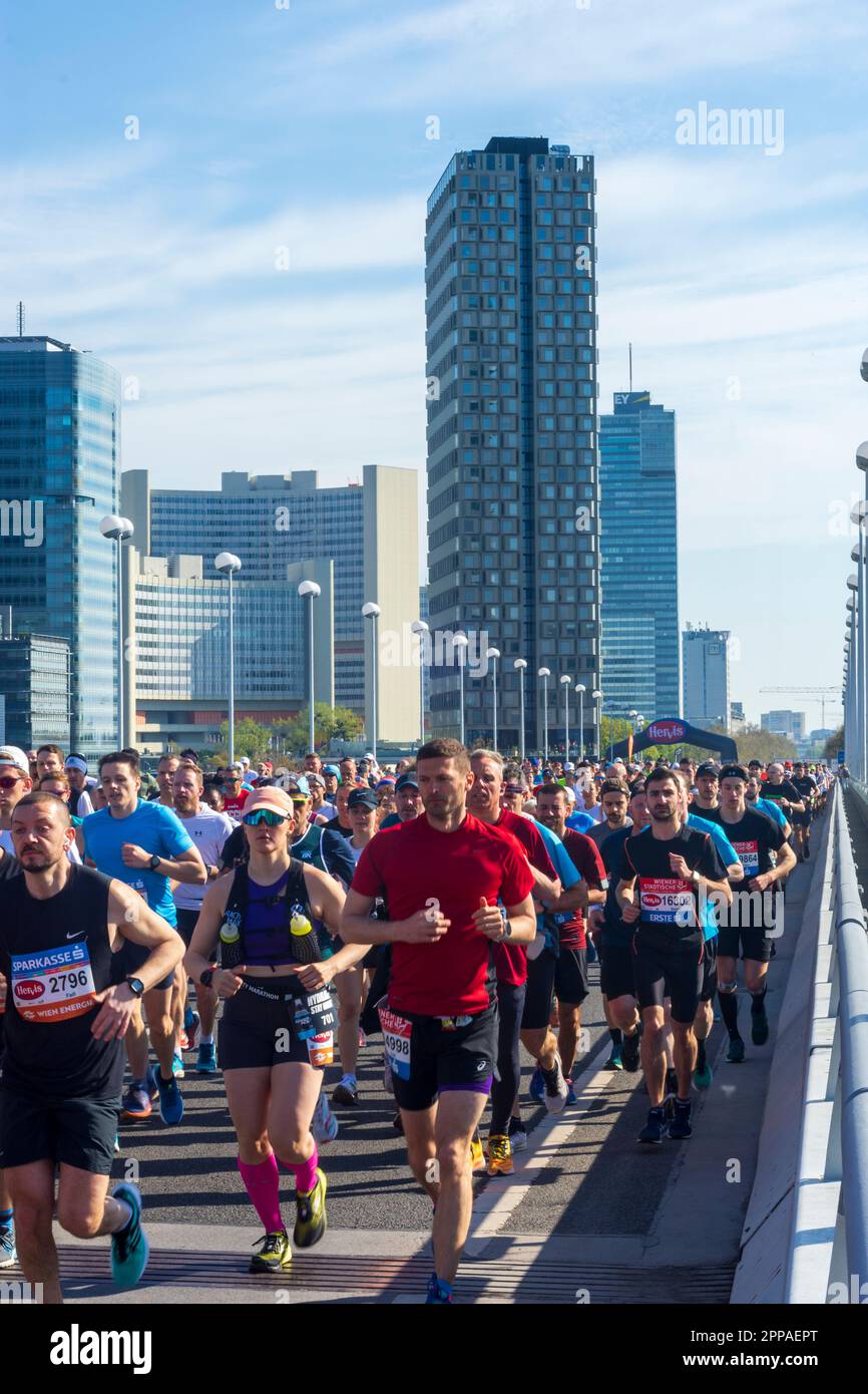 Vienna: start of 40. Vienna City Marathon, runner, skyline of Donaucity ...