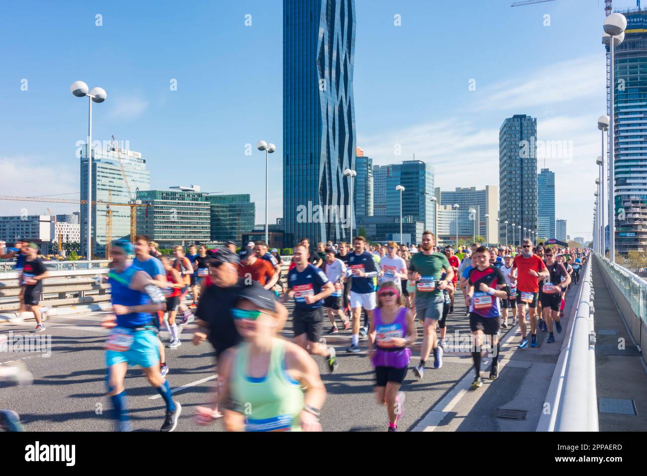 Vienna: start of 40. Vienna City Marathon, runner, skyline of Donaucity ...
