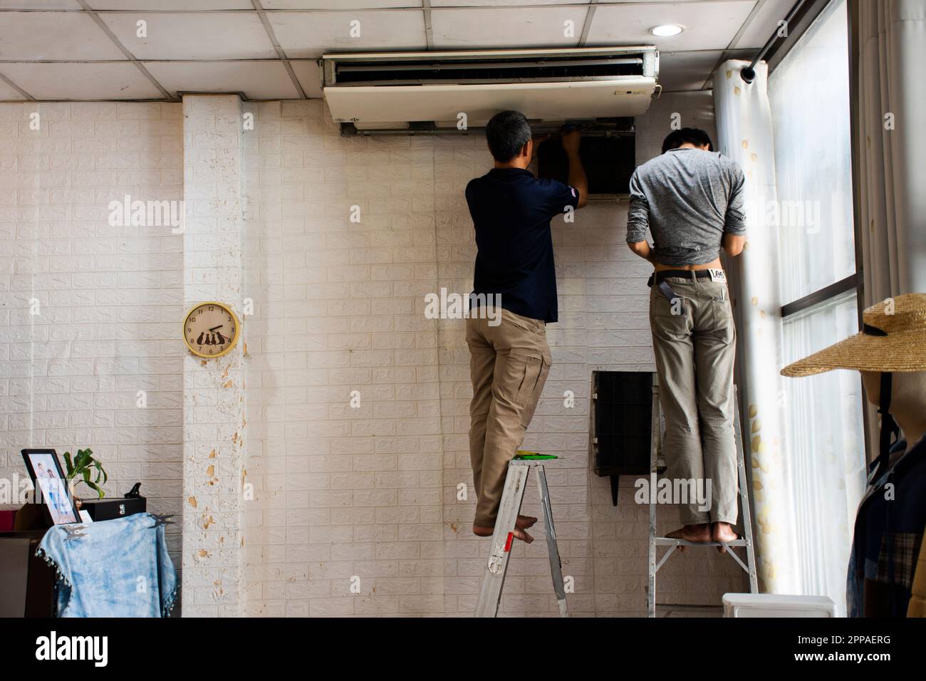 Mechanic working on compressor hi-res stock photography and images - Alamy