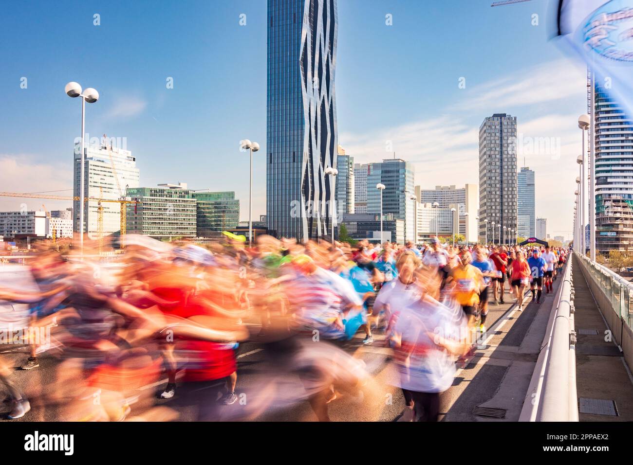 Vienna: start of 40. Vienna City Marathon, runner, skyline of Donaucity ...