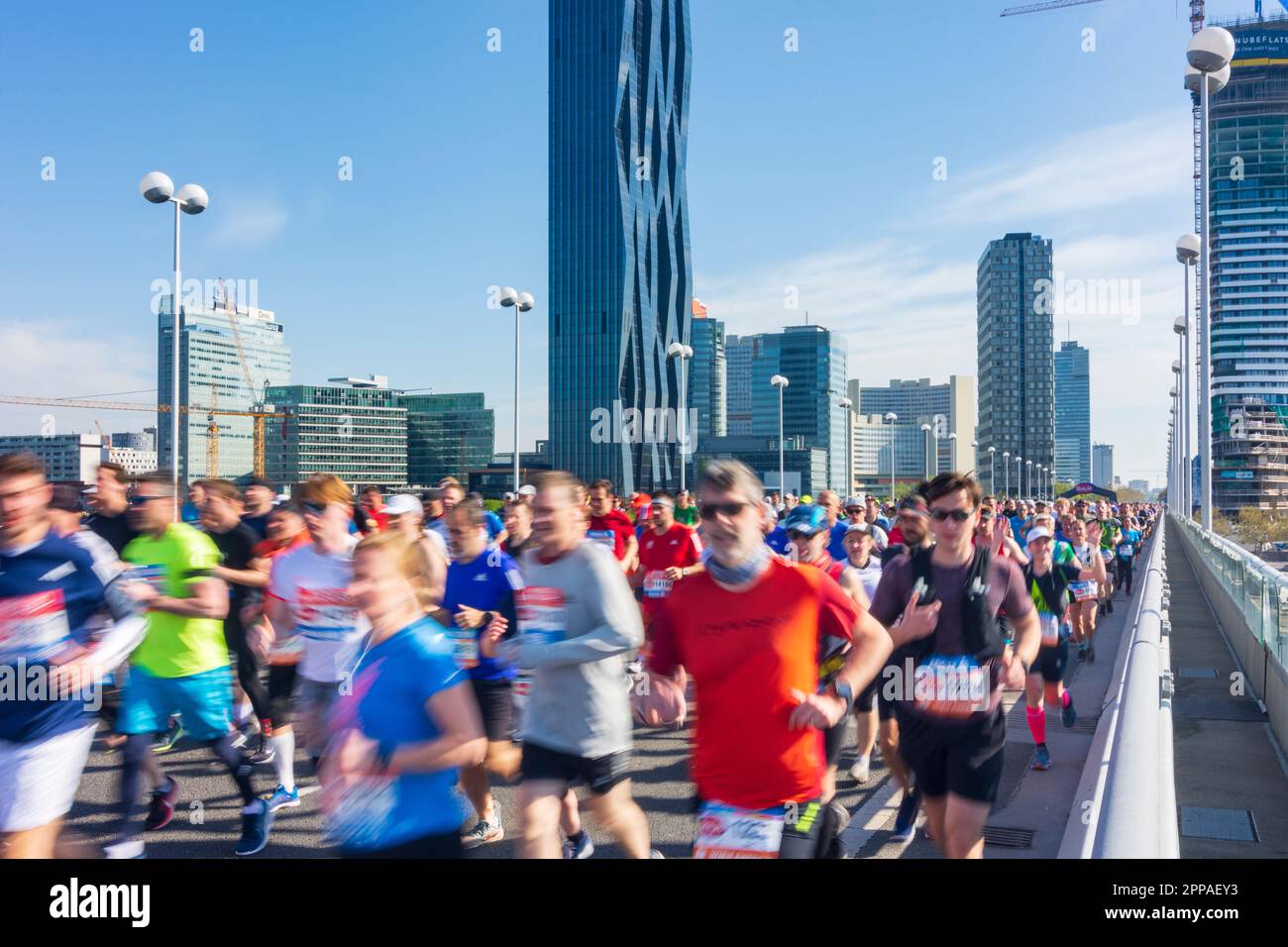 Vienna: start of 40. Vienna City Marathon, runner, skyline of Donaucity ...