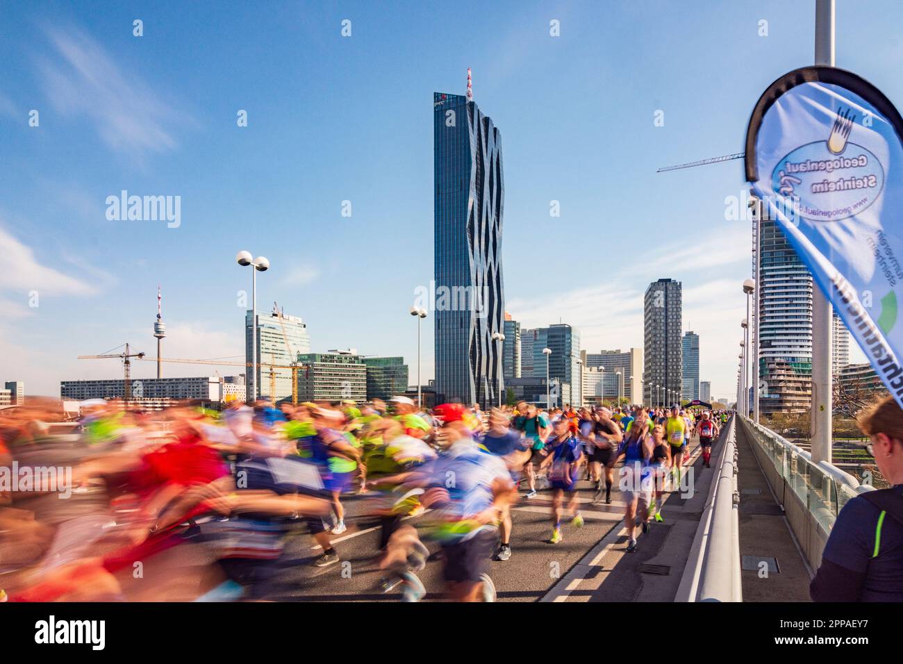 Vienna: start of 40. Vienna City Marathon, runner, skyline of Donaucity ...