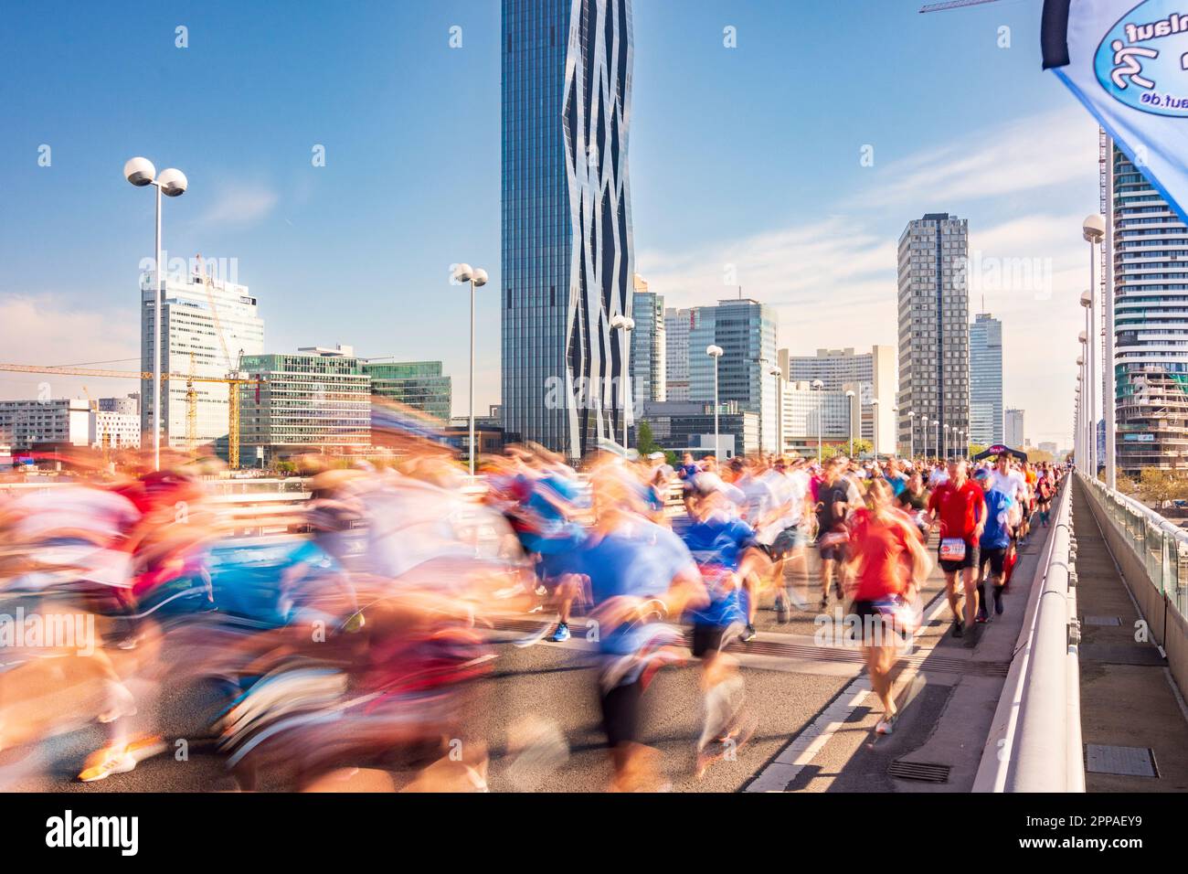 Vienna: start of 40. Vienna City Marathon, runner, skyline of Donaucity ...