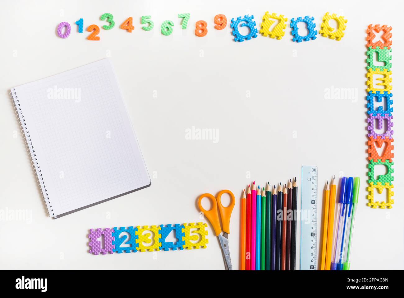 Stationery near letters figures Stock Photo - Alamy