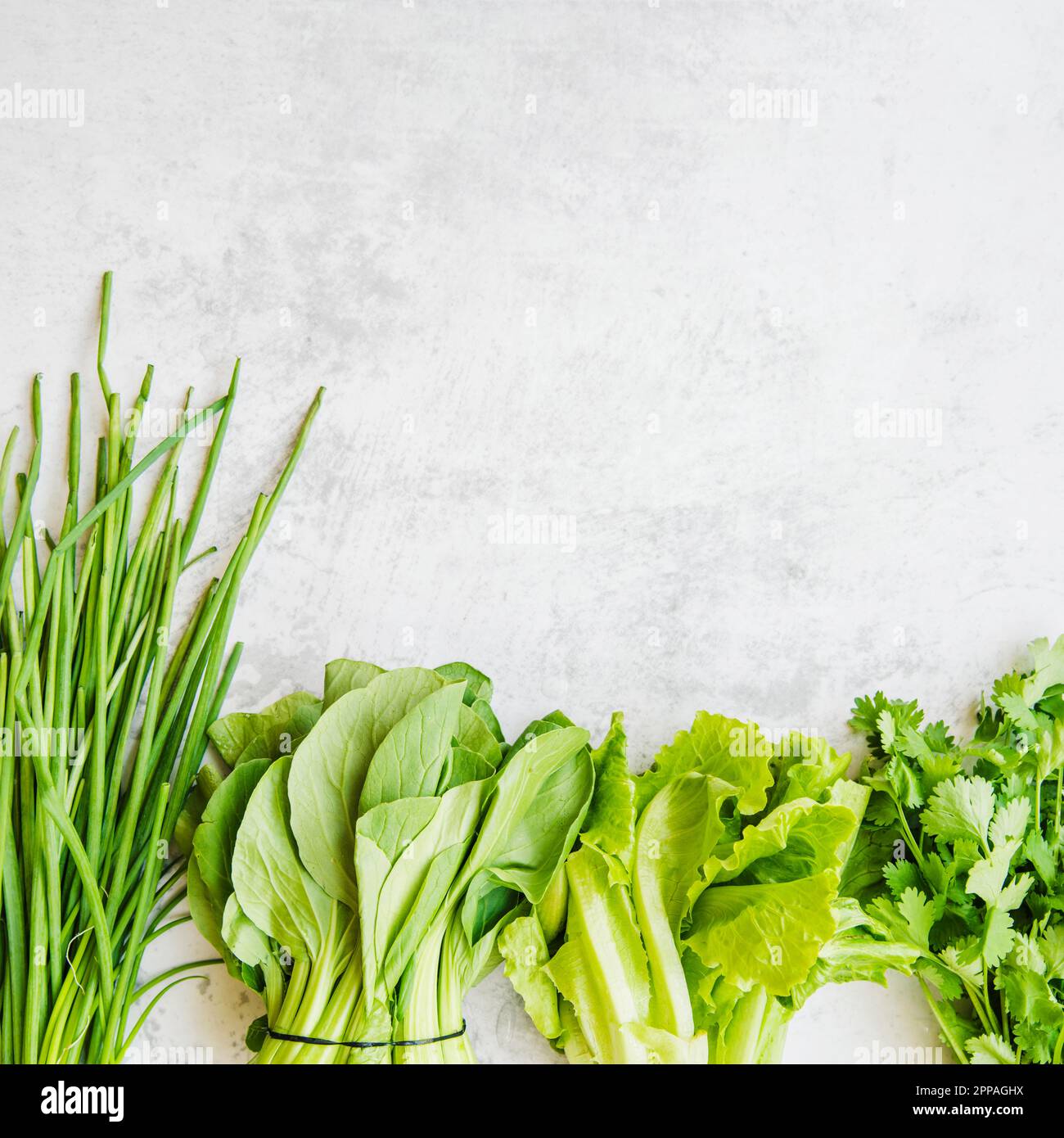 Various green vegetables arranged row Stock Photo - Alamy