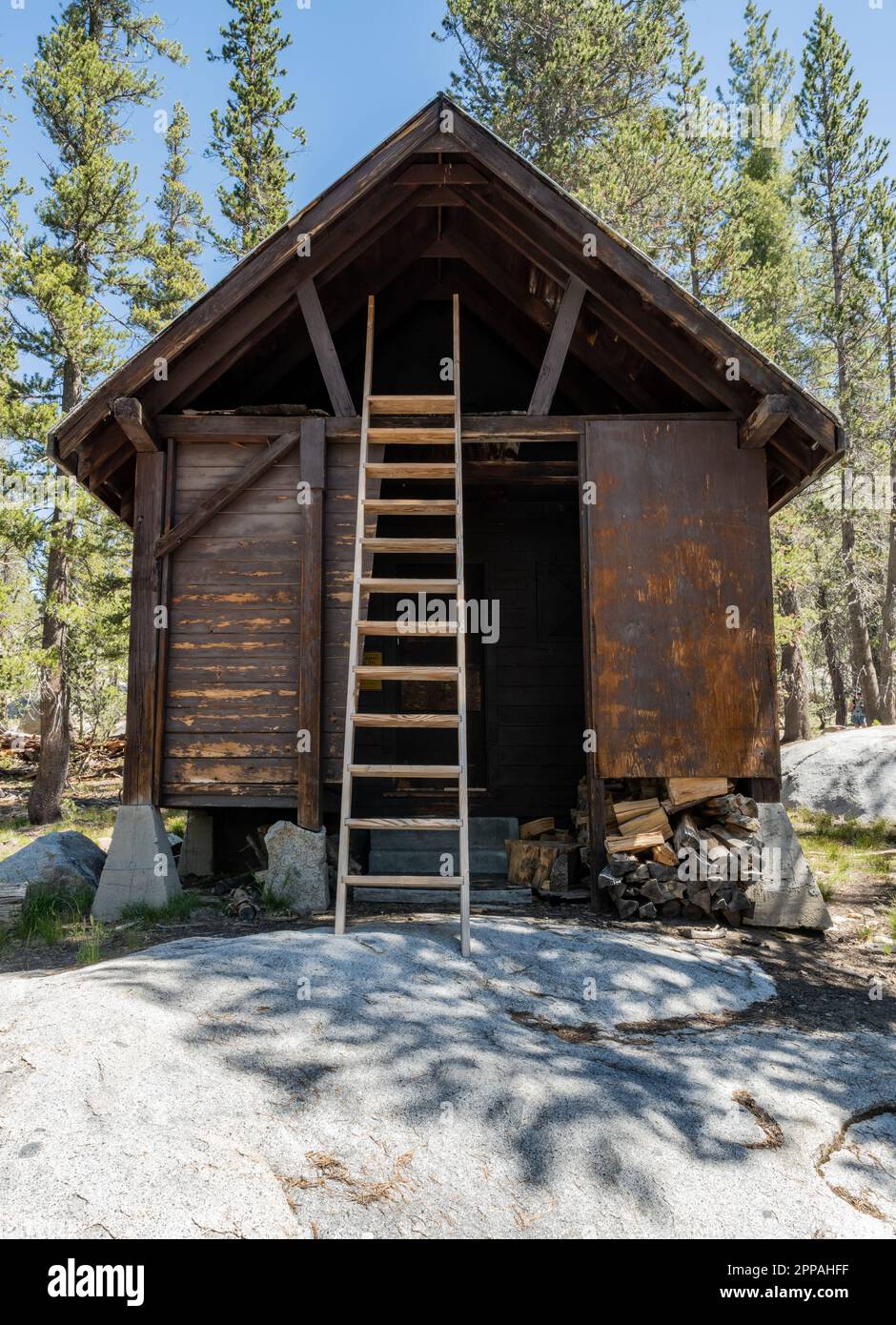Snow Patrol Cabin Sits On Large Granite Boulder in Yosemite backcountry ...