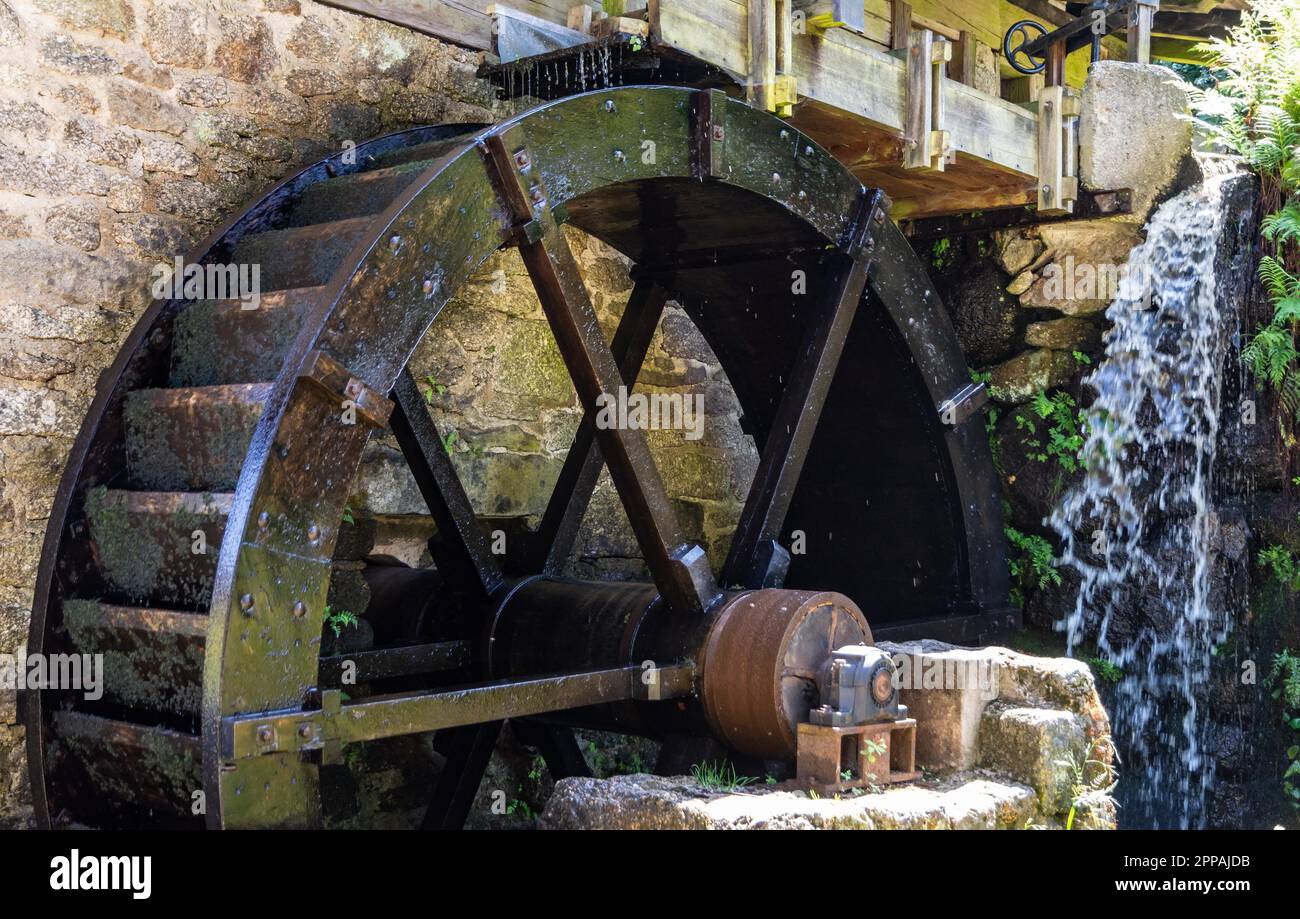 Hydropower with a vintage wooden water wheel Stock Photo - Alamy