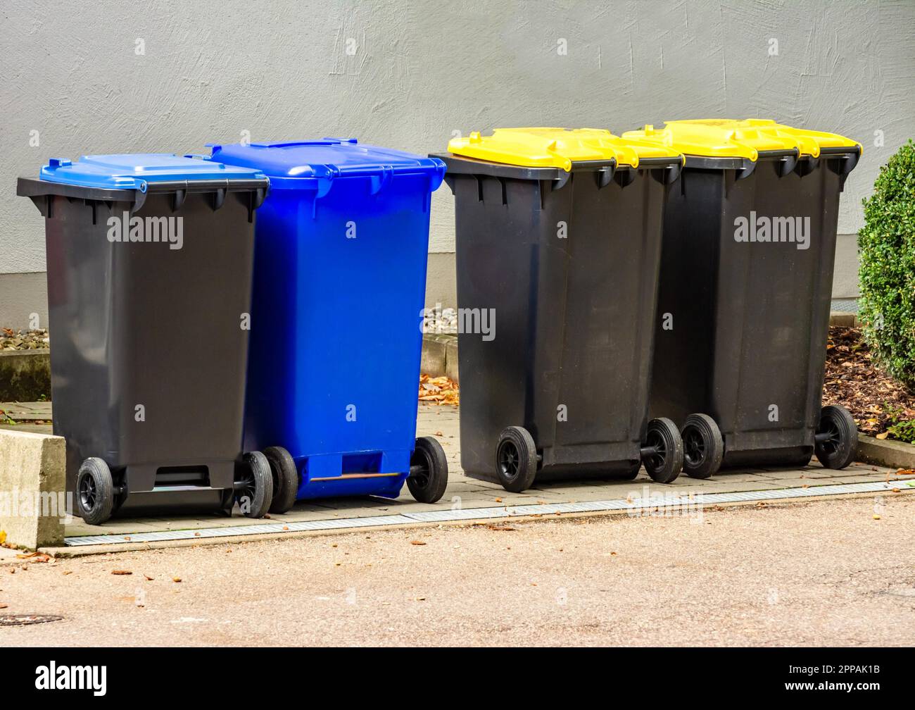 Row of garbage cans for wate separation and recycling Stock Photo - Alamy
