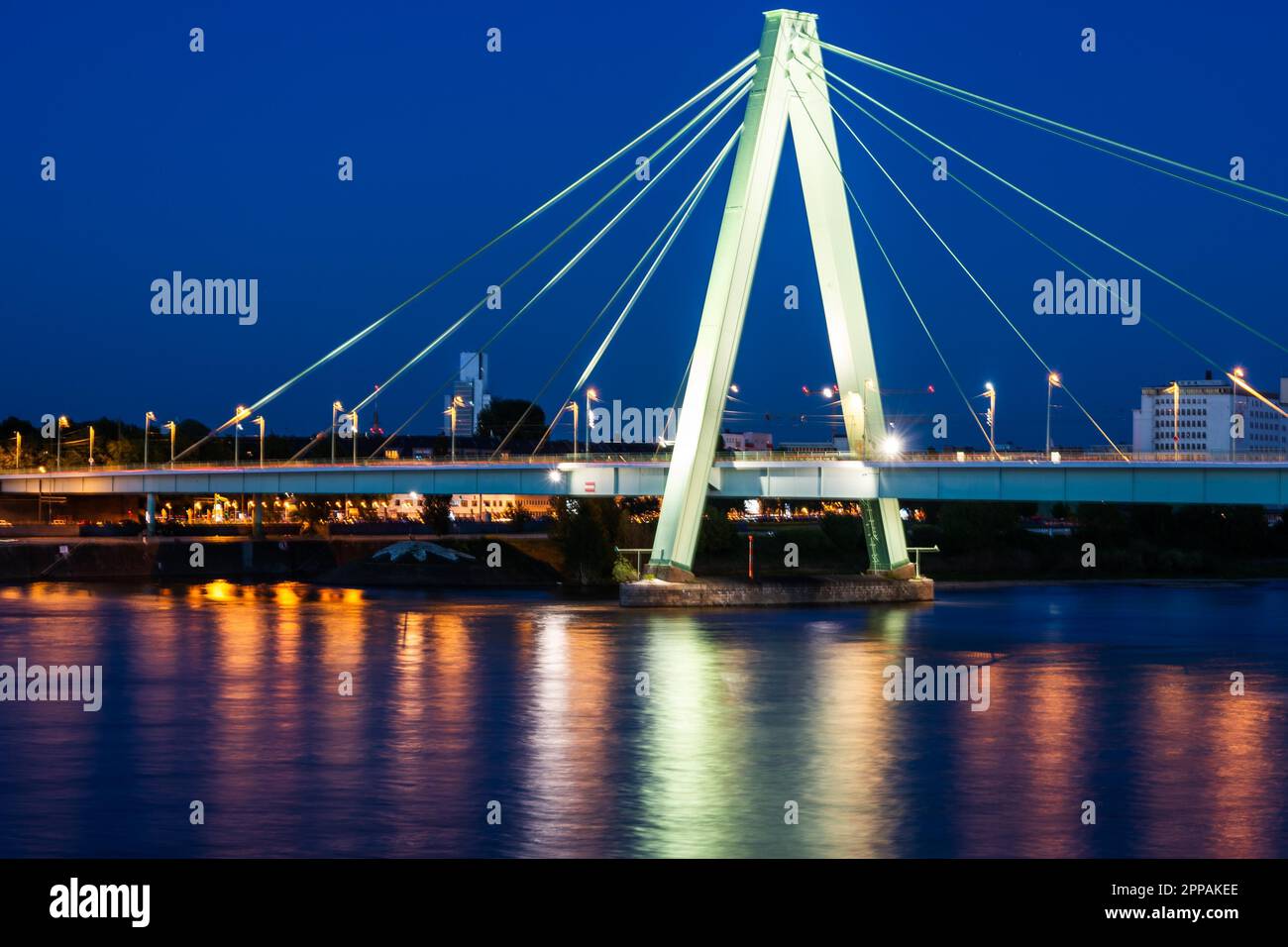 Illuminated bridge called Severinsbruecke accross the river Rhein in ...