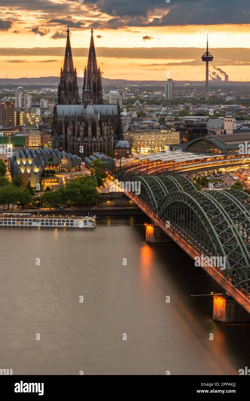 Cityscape of Cologne and the river Rhine during sunset Stock Photo - Alamy