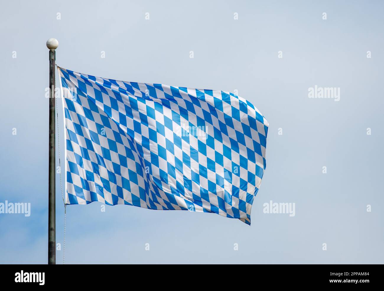 Bavarian flag and deep blue sky Stock Photo - Alamy