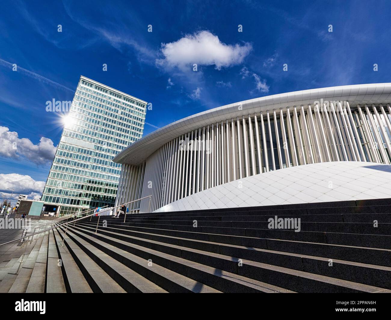 White concert hall with staircase, Philharmonie Luxembourg, architect ...