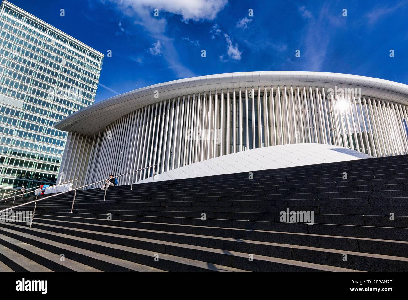 White concert hall with staircase, Philharmonie Luxembourg, architect ...