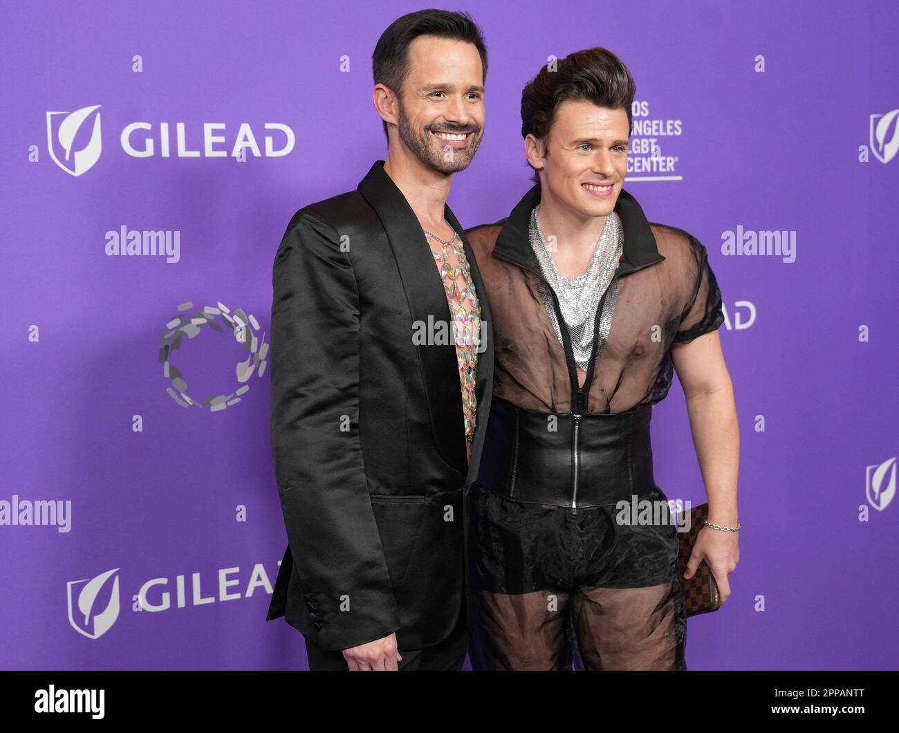 L R Emerson Collins And Blake Mciver Ewing At The Los Angeles Lgbt Center Gala Held At The