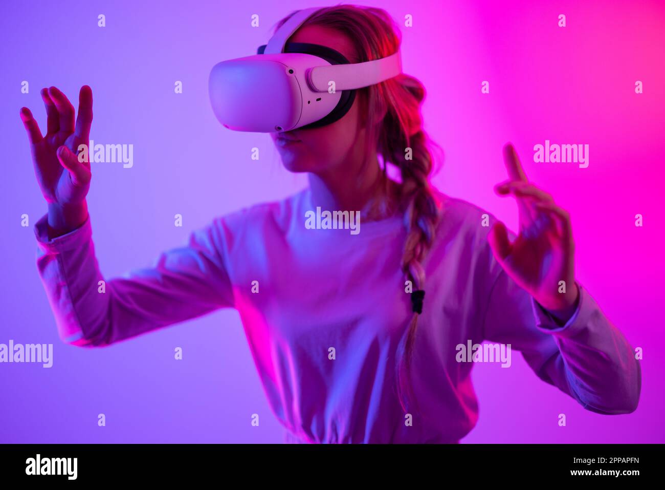 Exploring metaverse virtual reality with VR glasses Stock Photo - Alamy