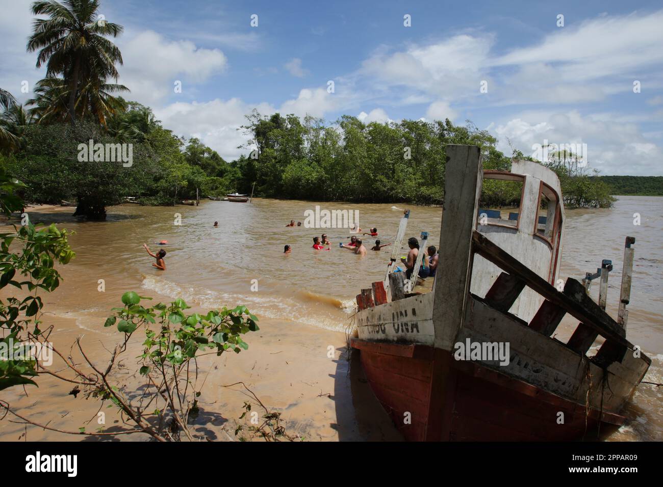 Marajo Island, Brazil. 22nd Apr, 2023. Locals enjoys near a boat lies ...