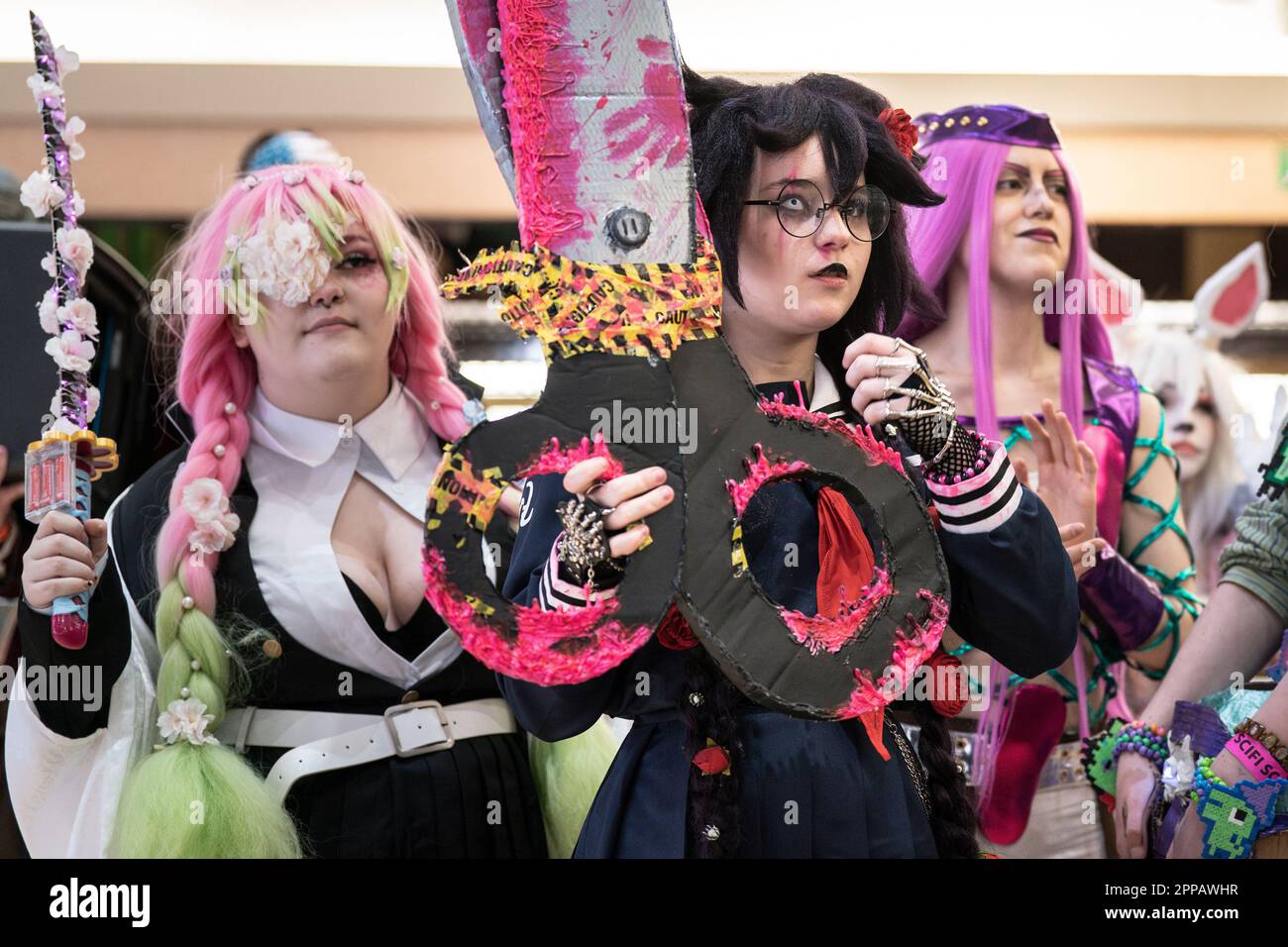 Attendees take part in a cosplay competition during the Sci Fi ...