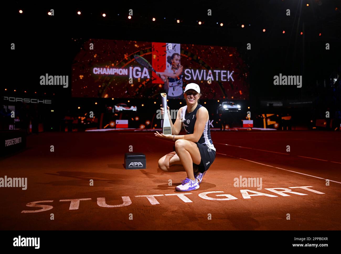 Poland's Iga Swiatek poses with a trophy after winning against Belarus' Aryna Sabalenka during ...