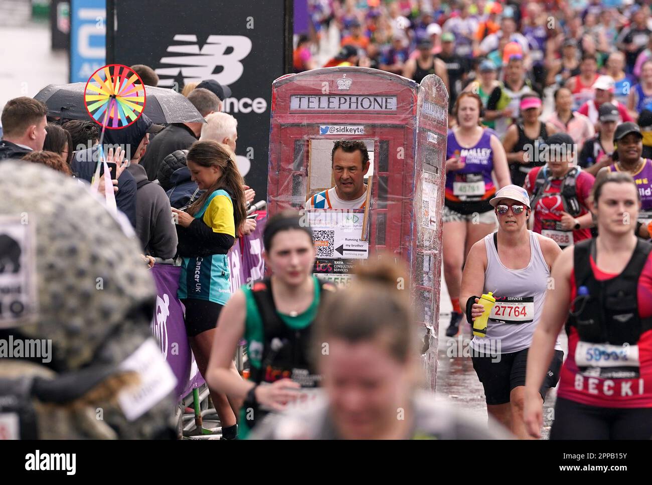 A competitor in a telephone box fancy dress during the TCS London ...