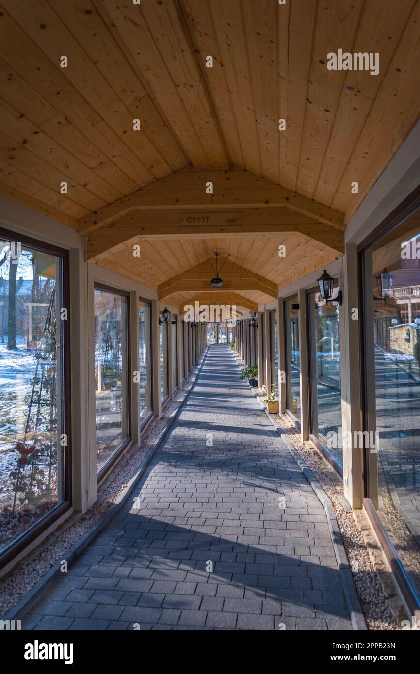 Glass tunnel passage in Chlewiska Spa in winter Stock Photo - Alamy