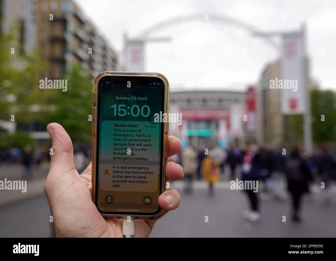 An emergency text alert test on a phone screen ahead of the Emirates FA ...
