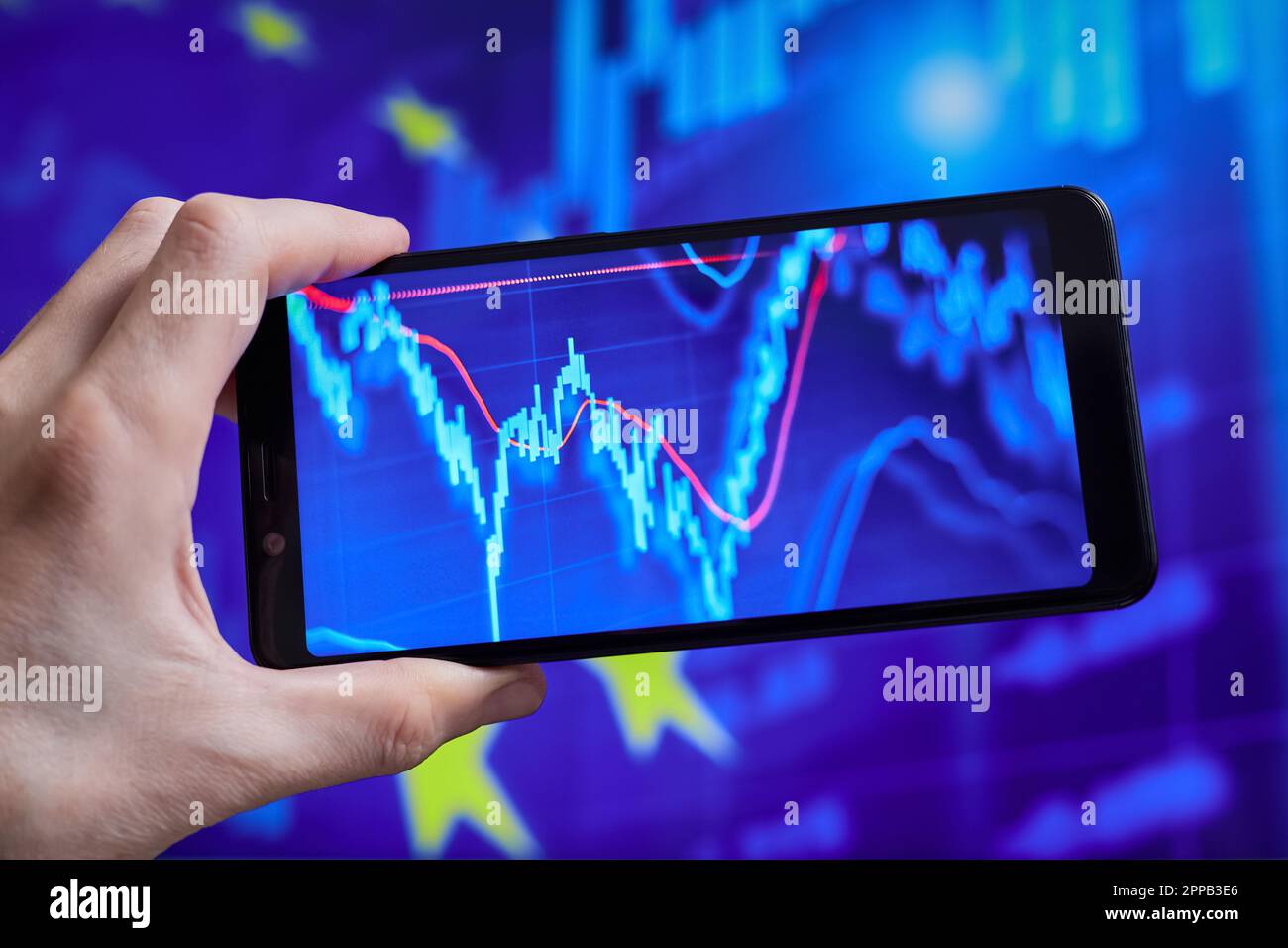 Investor analyzes trading data charts hi-res stock photography and ...