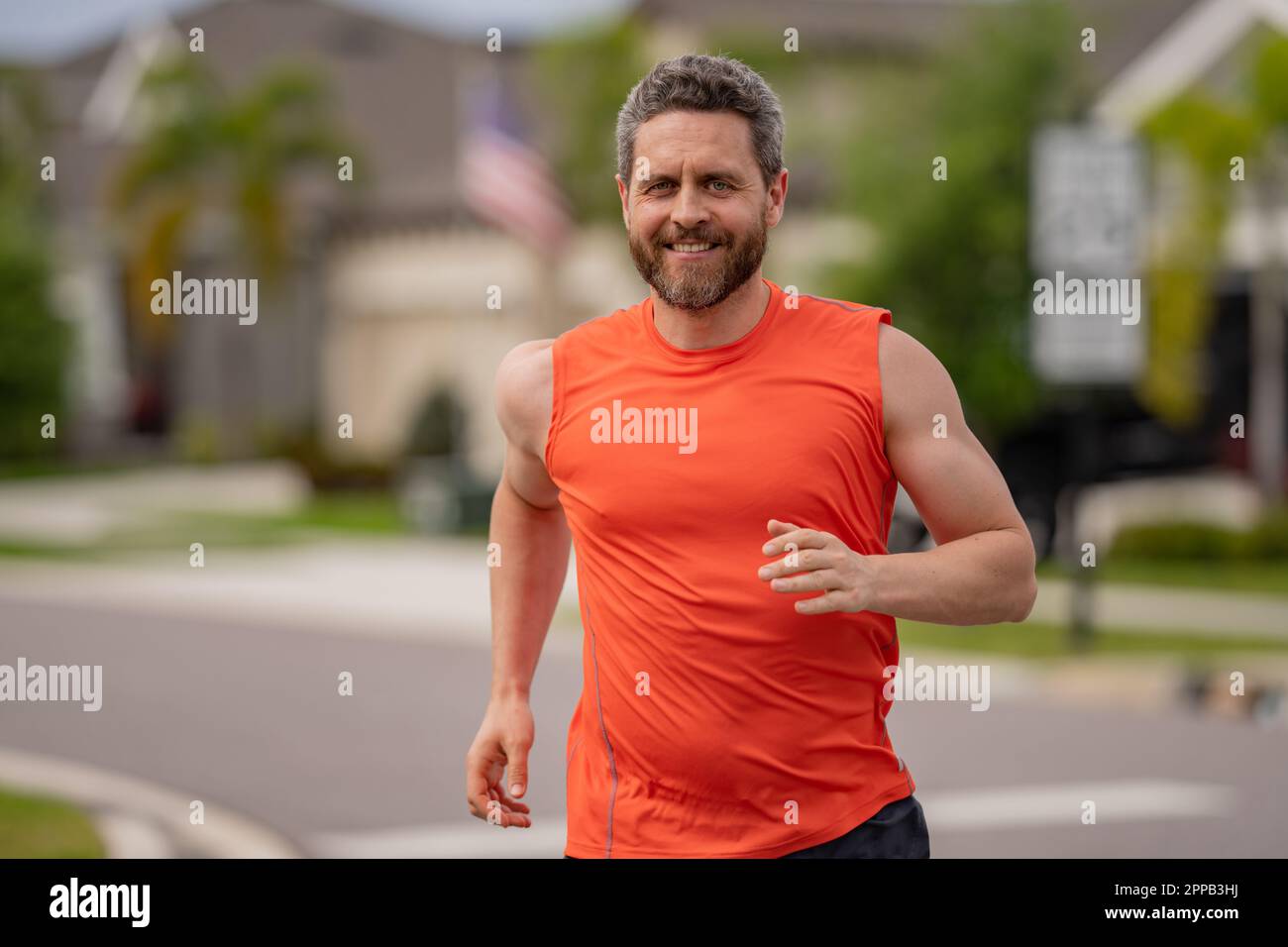 Running man sprinting workout outdoor. Fit athlete man running on ...