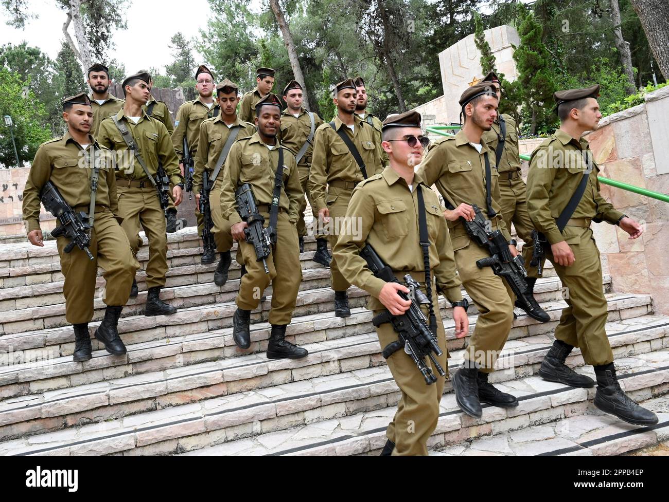 Jerusalem, Israel. 23rd Apr, 2023. Israeli soldiers walk to the graves ...