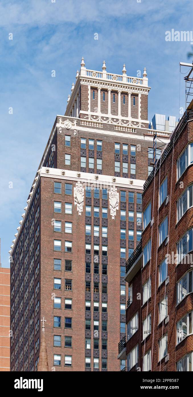 Bright white stone and terra cotta enliven the brick façade of 200 ...