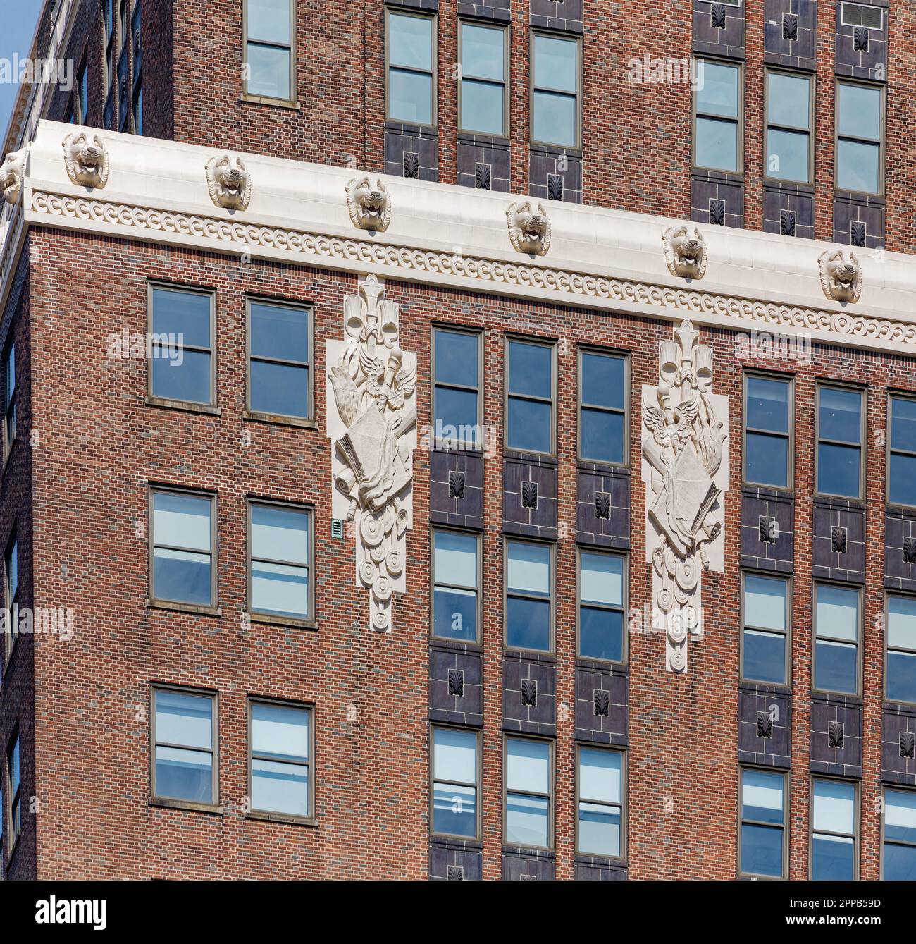 Bright white stone and terra cotta enliven the brick façade of 200 ...