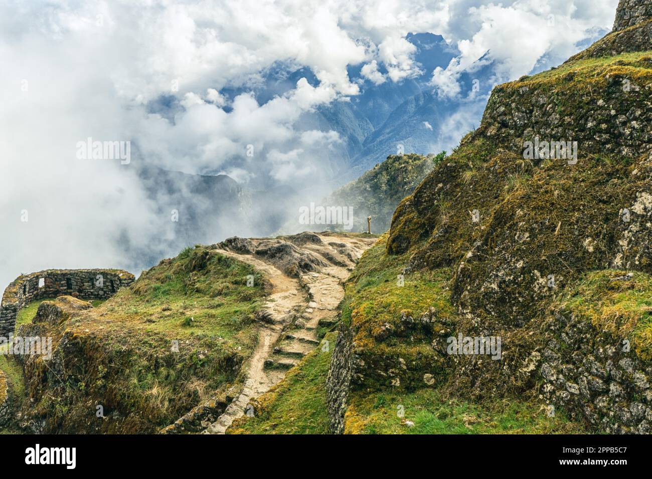 Part of the Inca trail route from Cusco to Machu Picchu with clouds ...