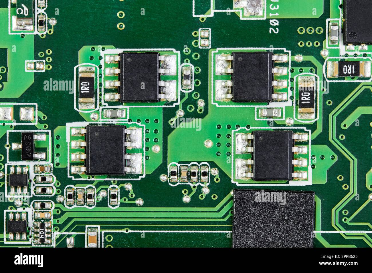 Close-up of computer chips on a part of electronic printed circuit ...