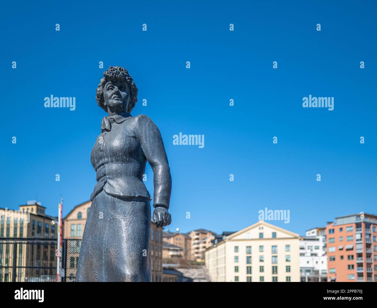 Bronze sculpture of author Moa Martinson by Peter Linde in the historic industrial landscape of ...