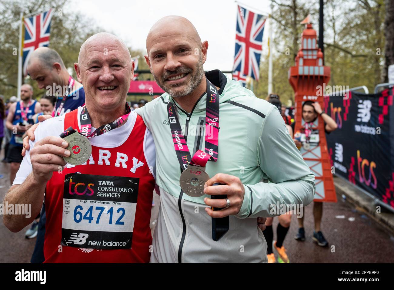 London, UK. 23 April 2023. Ex footballer Danny Mills (R) at the finish ...