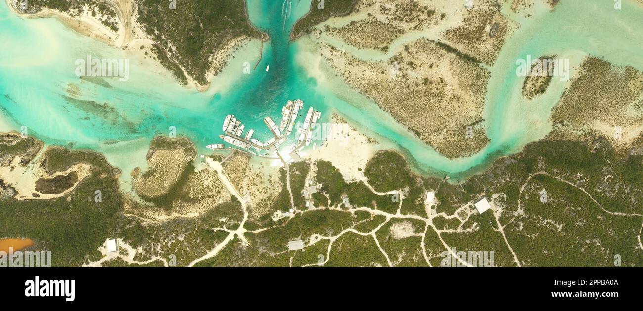 Aerial view of a tropical archipelago in the ocean with several ships ...