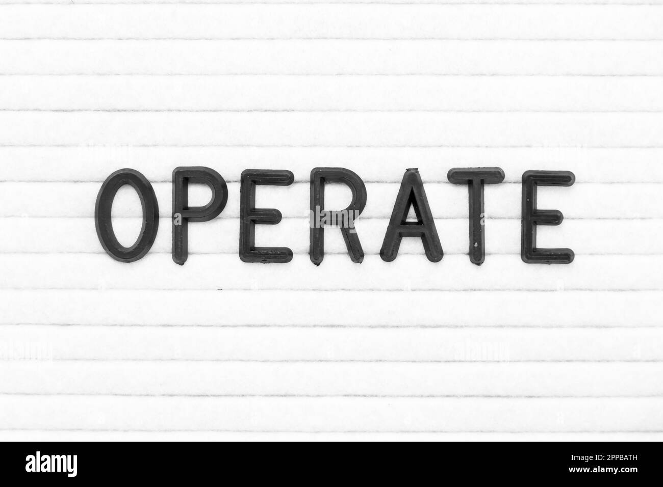 Black color letter in word operate on white felt board background Stock ...