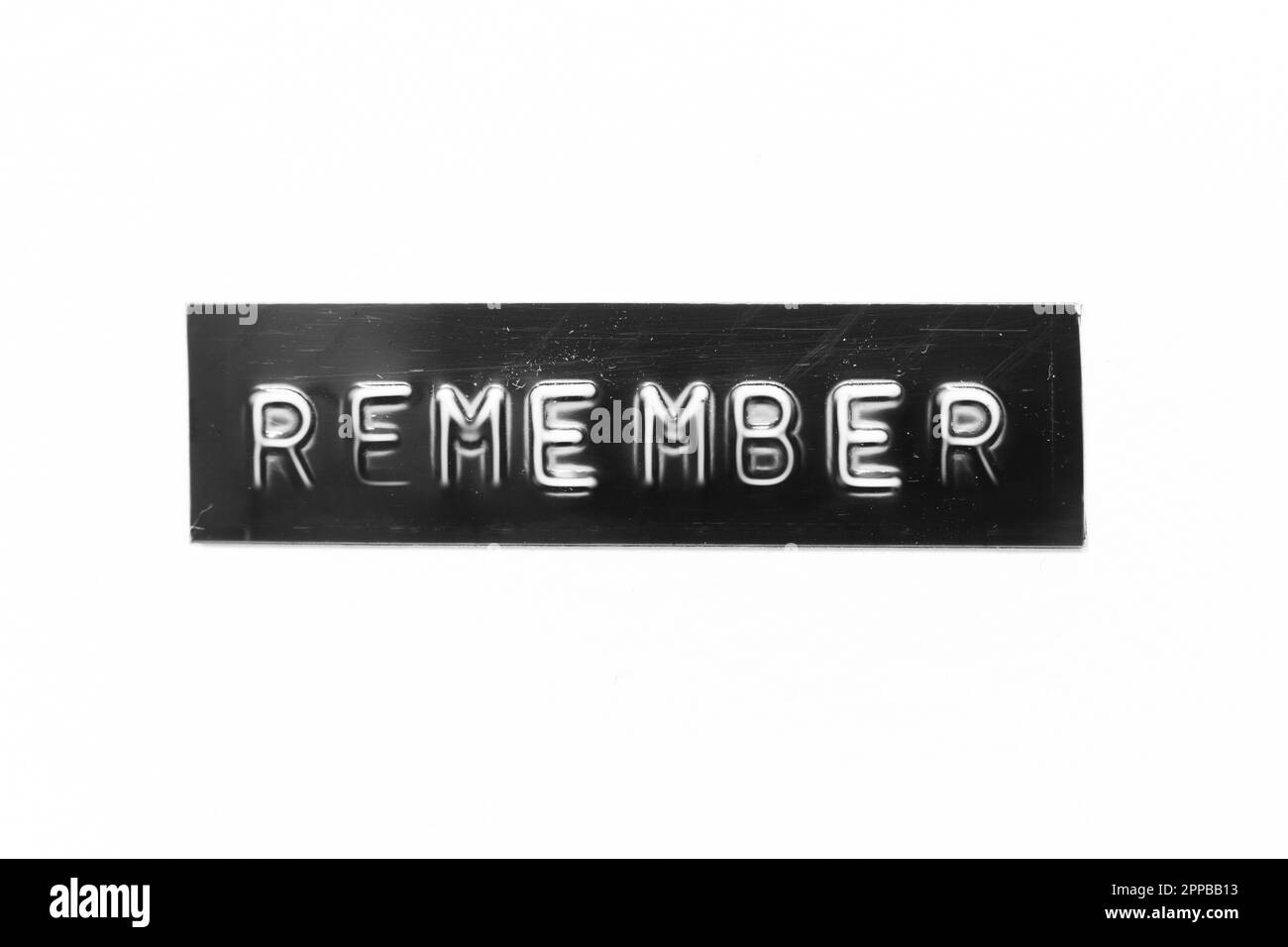 Black color banner that have embossed letter with word remember on ...