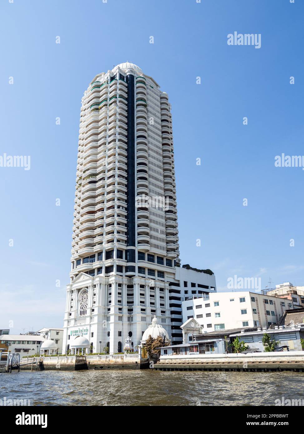 The Chao Praya River shore in Bangkok, Thailand, has many exclusive ...
