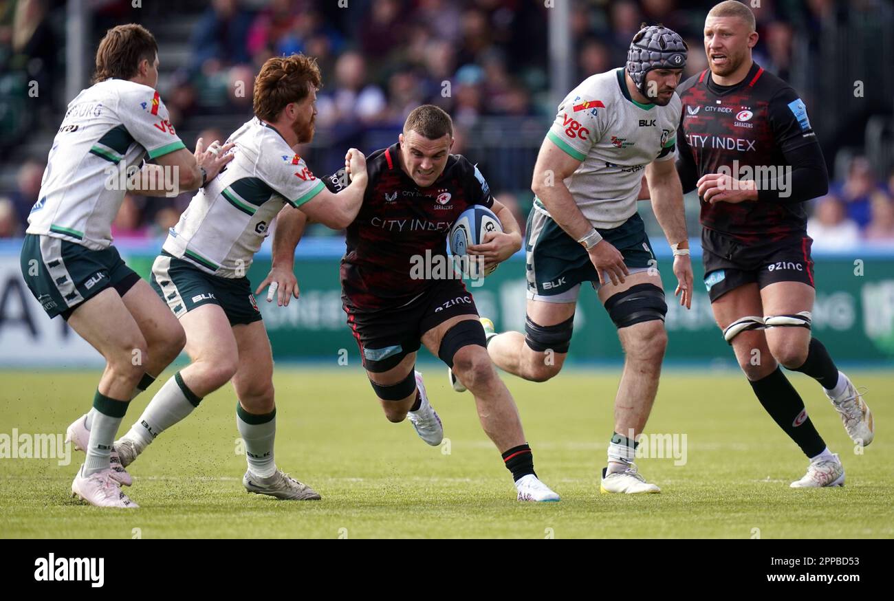 Saracens' Jackson Wray (centre) tackled by London Irish's Rory Jennings ...