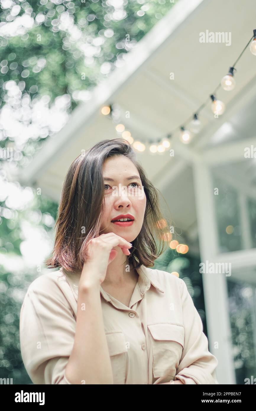 Standing under street lamp hi-res stock photography and images - Alamy