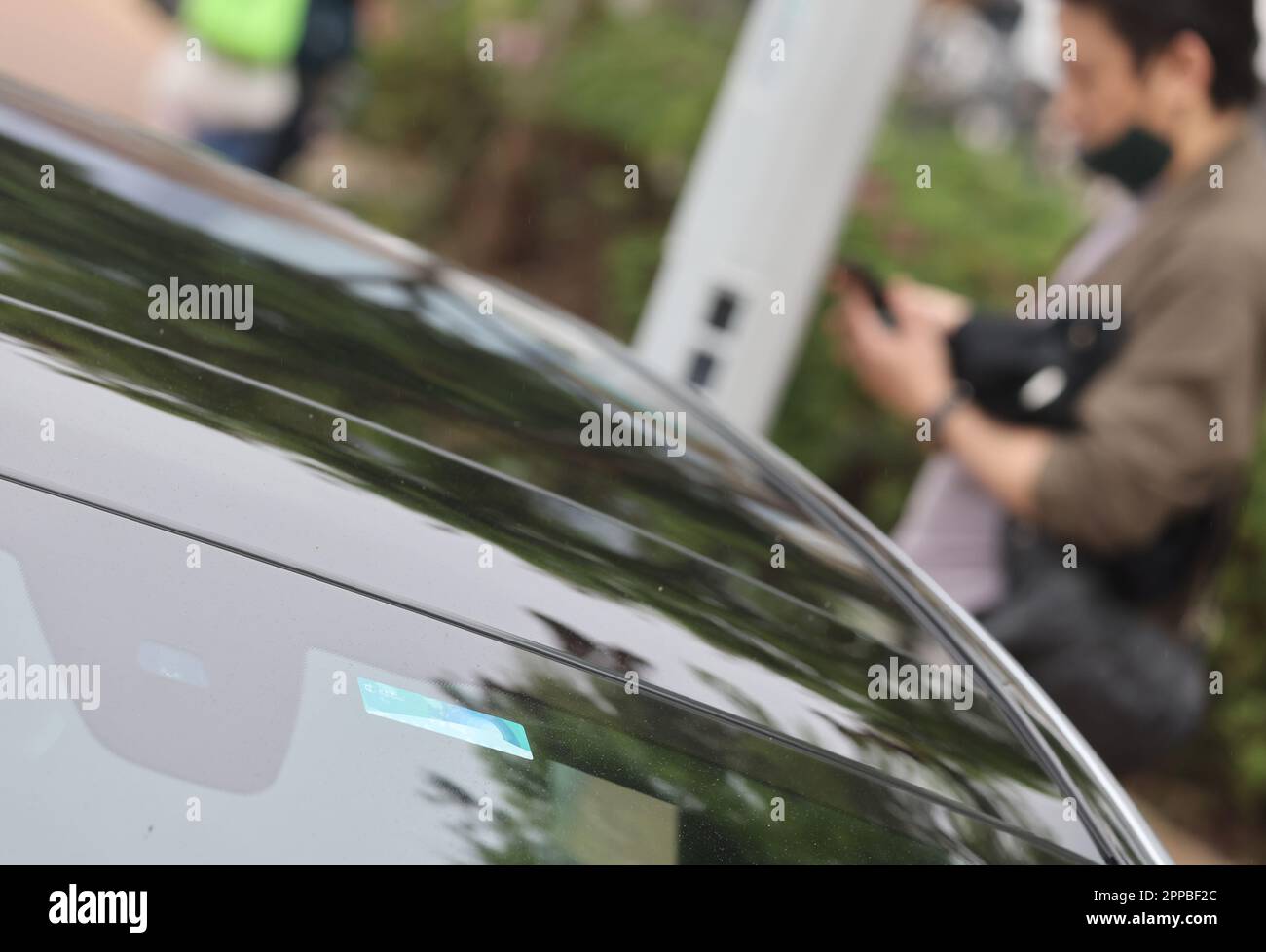 HKeToll sticker is seen on a car's windshield, in Central. HKeToll is a ...