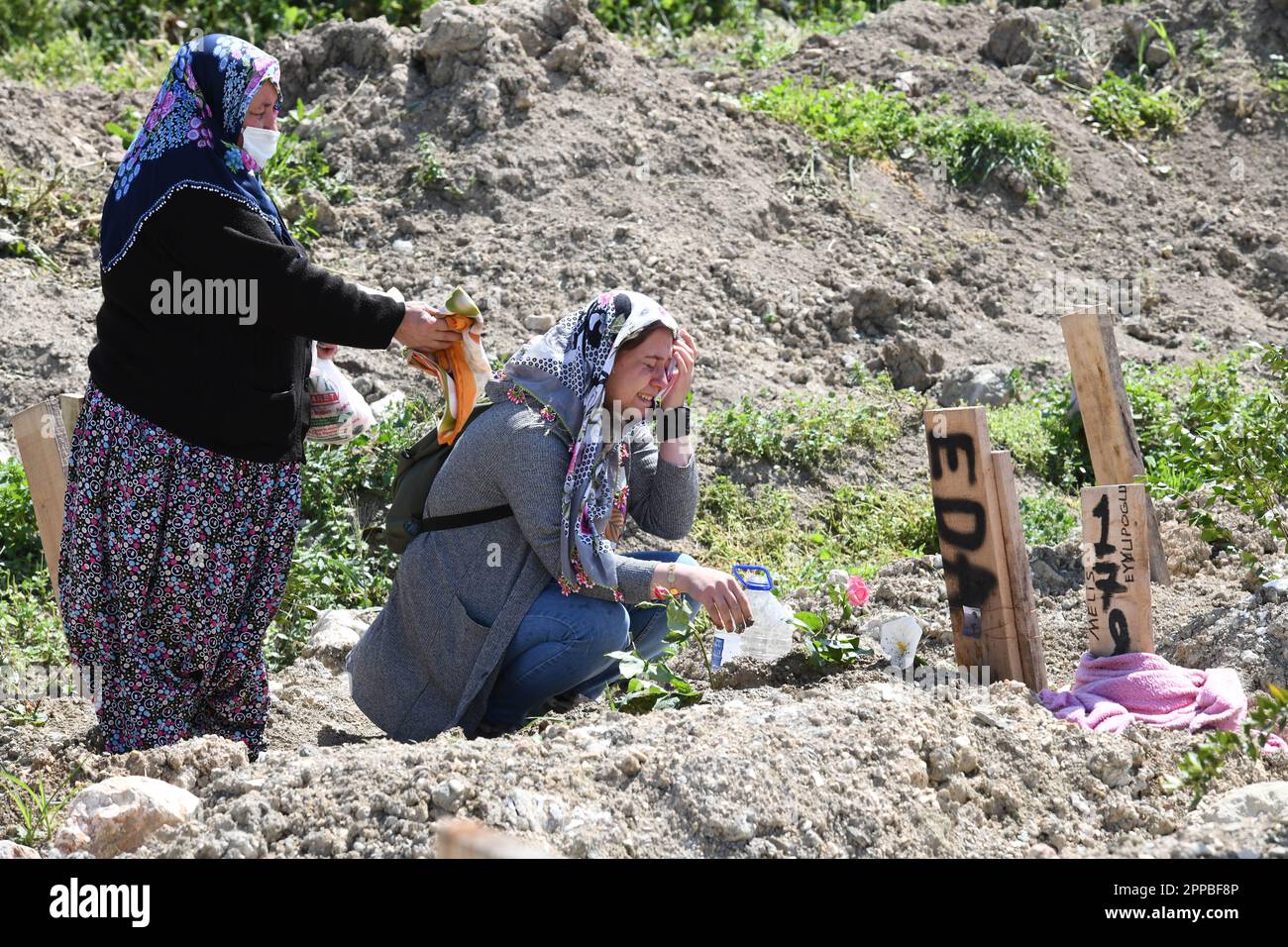 Hatay, Hatay province. 23rd Apr, 2023. People mourn for their relatives ...