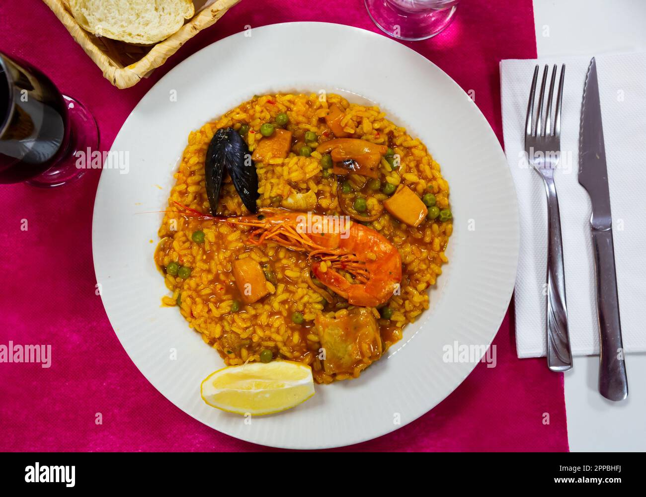 Spainsh dish seafood paella with rice, shrimps and mussels Stock Photo ...