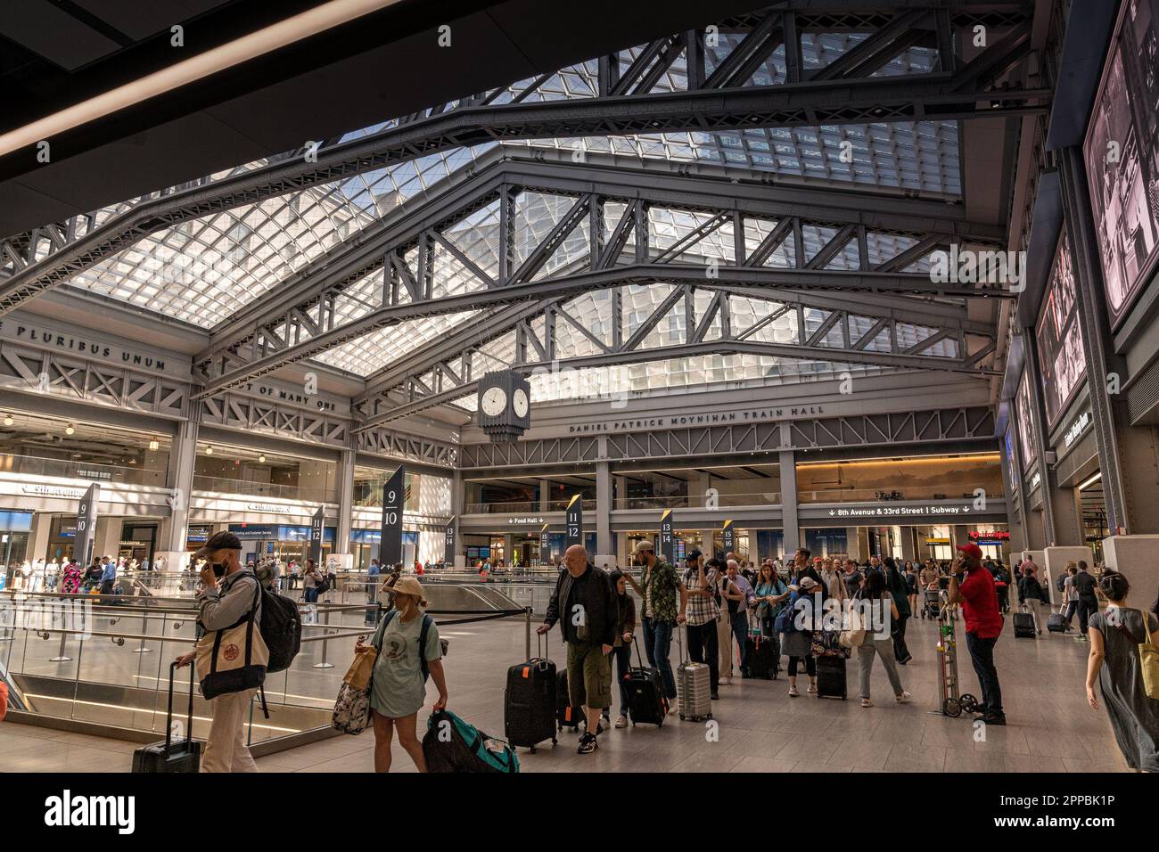 New York, NY - USA - April 14, 2023 Horizontal view of people lined up ...