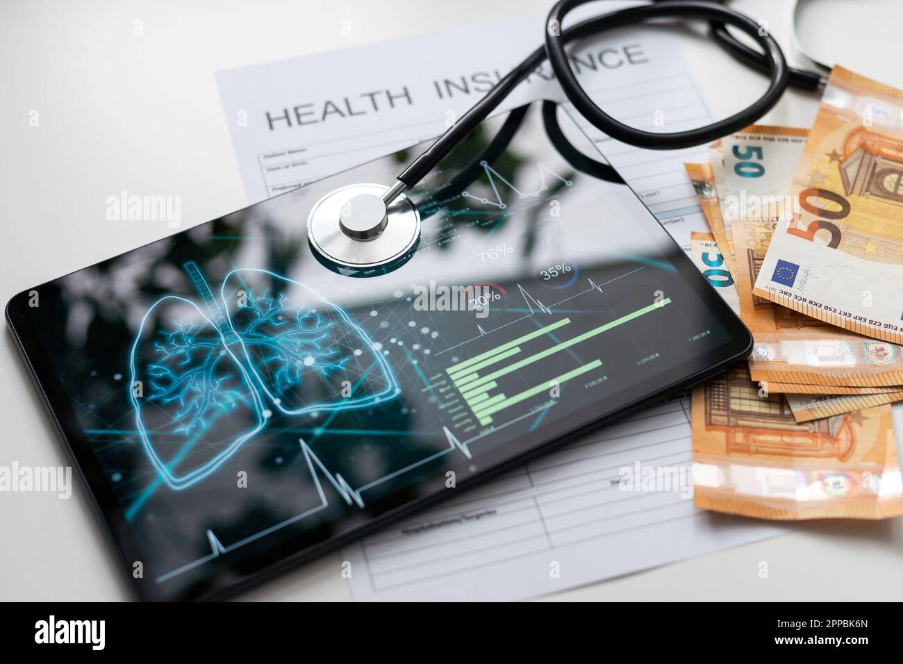 Modern social health insurance program. Tablet computer with healthcare ...