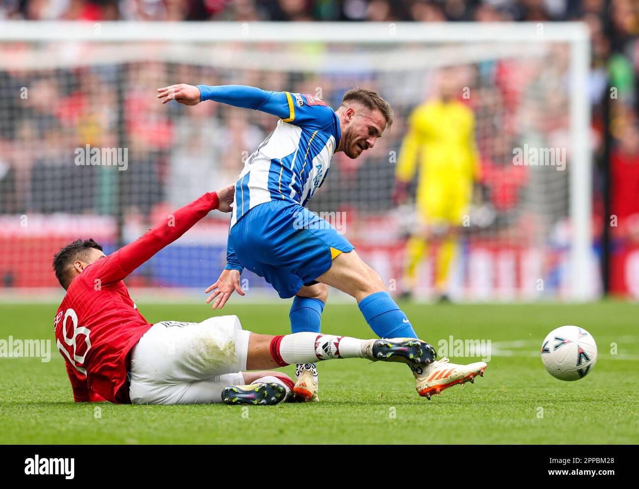 London, UK. 23rd Apr, 2023. Casemiro of Manchester United (left) and Alexis Mac Allister of ...